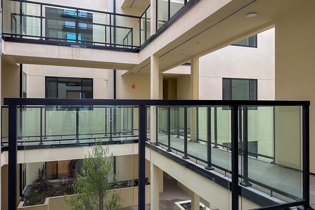 Top Continuous Glass Railing | West Coast Railing